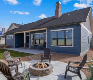 blue house gravel patio fire pit | Bray Topsoil & Gravel